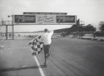 And he takes the Checkered Flag